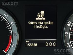 Brown Skoda Karoq 2021 in Valmiera, with an engine capacity of 2.00 L and mileage of 156 thousand km for 17500 €, photo 14 on AUTOMOTO.COM.LV