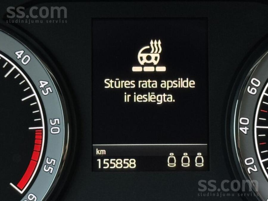 Brown Skoda Karoq 2021 in Valmiera, with an engine capacity of 2.00 L and mileage of 156 thousand km for 17500 €, photo 14 on AUTOMOTO.COM.LV
