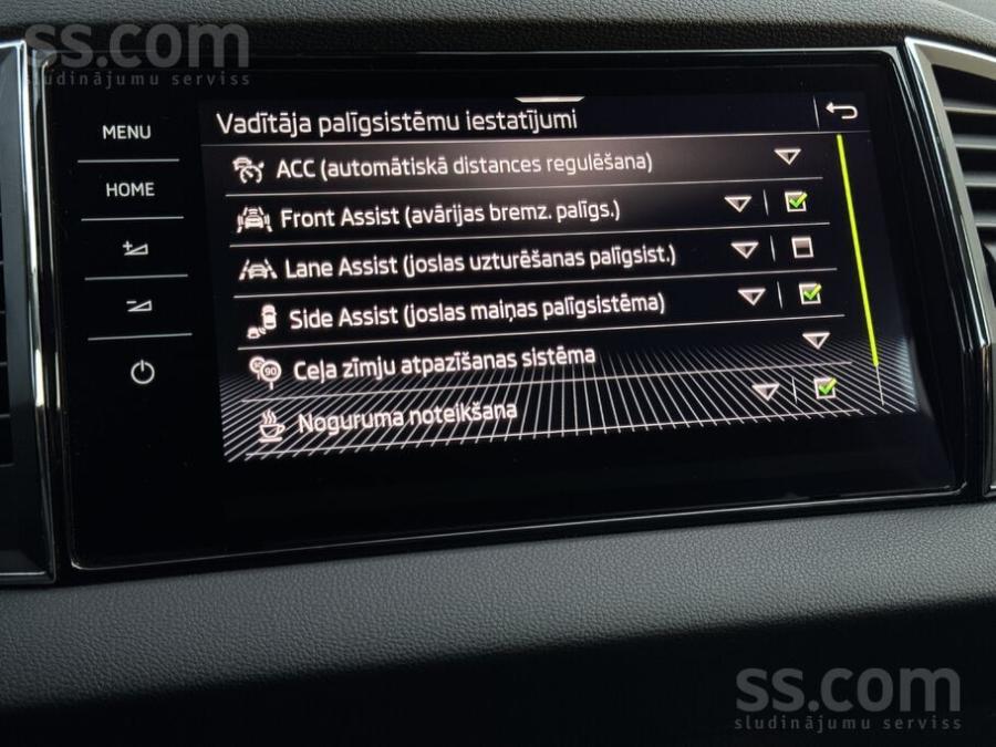 Brown Skoda Karoq 2021 in Valmiera, with an engine capacity of 2.00 L and mileage of 156 thousand km for 17500 €, photo 16 on AUTOMOTO.COM.LV