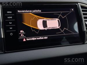 Brown Skoda Karoq 2021 in Valmiera, with an engine capacity of 2.00 L and mileage of 156 thousand km for 17500 €, photo 18 on AUTOMOTO.COM.LV