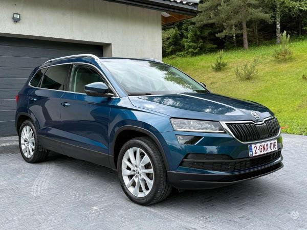 Green Skoda Karoq 2018 in Utena, with an engine capacity of 1.97 L and mileage of 232 thousand km for 13950 €, photo 3 on AUTOMOTO.COM.LV