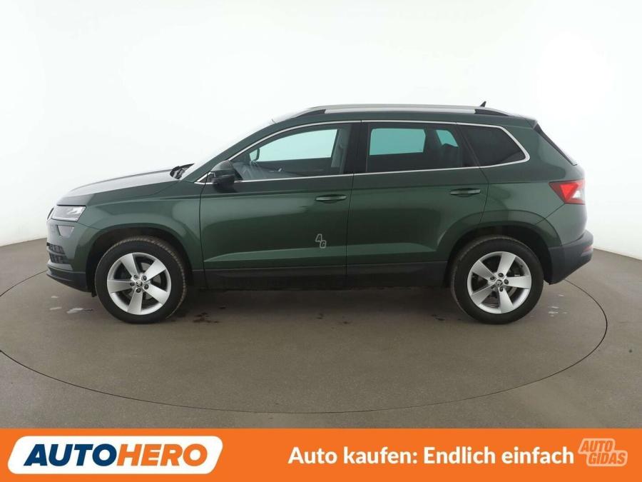 Green Skoda Karoq 2021 in Kaunas, with an engine capacity of 1.50 L and mileage of 49 thousand km for 27087 €, photo 3 on AUTOMOTO.COM.LV