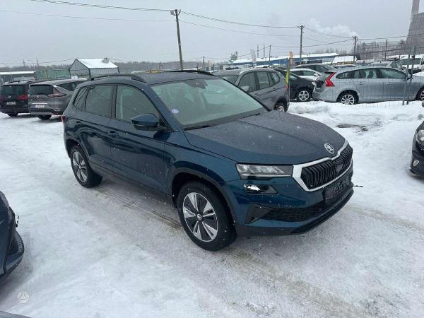Green Skoda Karoq 2023 in Kaunas, with an engine capacity of 1.50 L and mileage of 100 thousand km for 20900 €, photo 1 on AUTOMOTO.COM.LV