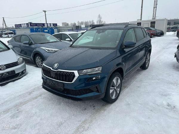 Green Skoda Karoq 2023 in Kaunas, with an engine capacity of 1.50 L and mileage of 100 thousand km for 20900 €, photo 2 on AUTOMOTO.COM.LV