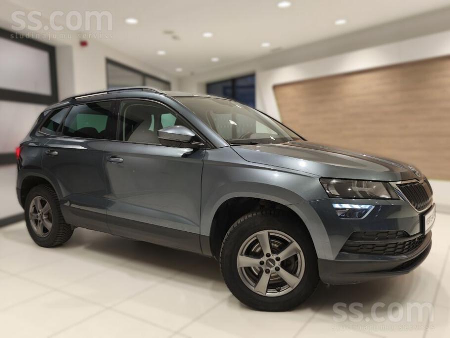 Grey Skoda Karoq 2018 in Riga, with an engine capacity of 1.60 L and mileage of 124 thousand km for 16990 €, photo 1 on AUTOMOTO.COM.LV