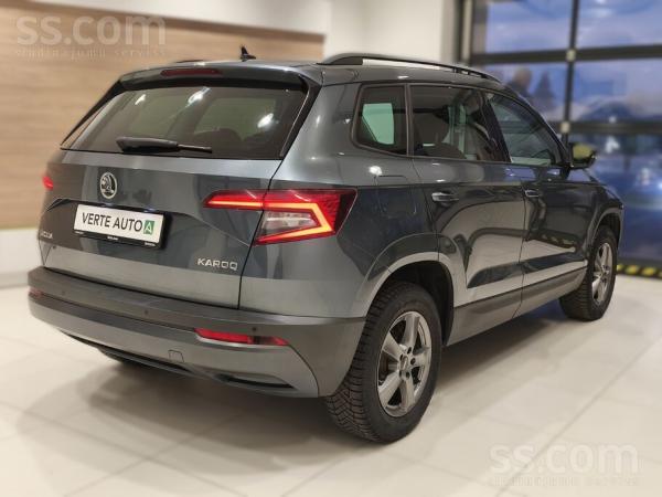 Grey Skoda Karoq 2018 in Riga, with an engine capacity of 1.60 L and mileage of 124 thousand km for 16990 €, photo 4 on AUTOMOTO.COM.LV