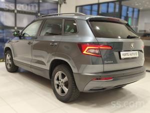 Grey Skoda Karoq 2018 in Riga, with an engine capacity of 1.60 L and mileage of 124 thousand km for 16990 €, photo 6 on AUTOMOTO.COM.LV
