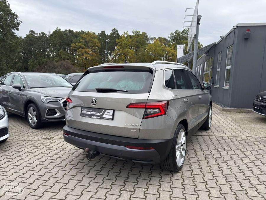 Grey Skoda Karoq 2018 in Kaunas, with an engine capacity of 2.00 L and mileage of 76 thousand km for 26510 €, photo 4 on AUTOMOTO.COM.LV