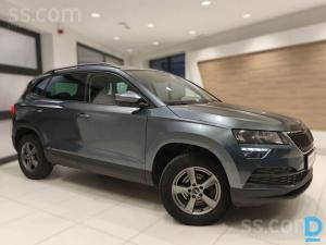 Grey Skoda Karoq 2018 in Riga, with an engine capacity of 1.60 L and mileage of 124 thousand km for 16690 €, photo  on AUTOMOTO.COM.LV
