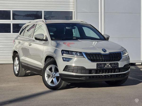 Grey Skoda Karoq 2018 in Jonava, with an engine capacity of 2.00 L and mileage of 196 thousand km for 16200 €, photo 1 on AUTOMOTO.COM.LV