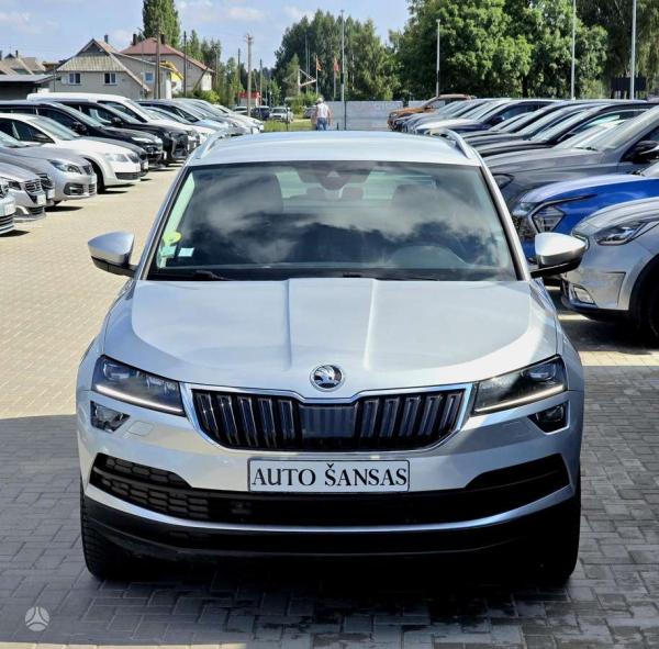 Grey Skoda Karoq 2018 in Taurage, with an engine capacity of 1.60 L and mileage of 121 thousand km for 14700 €, photo 4 on AUTOMOTO.COM.LV