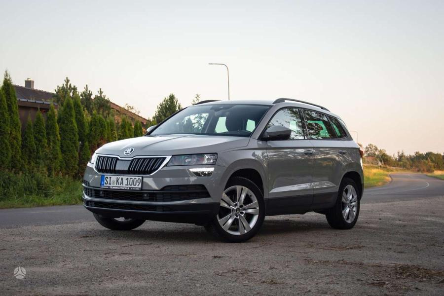 Grey Skoda Karoq 2018 in Elektrenai, with an engine capacity of 1.97 L and mileage of 236 thousand km for 14350 €, photo 4 on AUTOMOTO.COM.LV