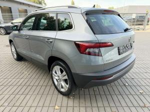 Grey Skoda Karoq 2018 in Kaunas, with an engine capacity of 1.50 L and mileage of 155 thousand km for 15900 €, photo 5 on AUTOMOTO.COM.LV