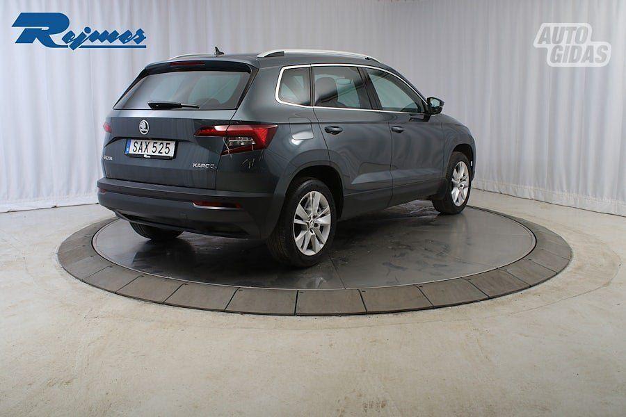 Grey Skoda Karoq 2019 in Kaunas, with an engine capacity of 0.00 L and mileage of 95 thousand km for 22418 €, photo 4 on AUTOMOTO.COM.LV