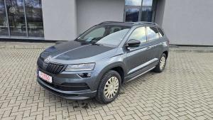 Grey Skoda Karoq 2019 in Kaunas, with an engine capacity of 1.97 L and mileage of 171 thousand km for 21900 €, photo  on AUTOMOTO.COM.LV