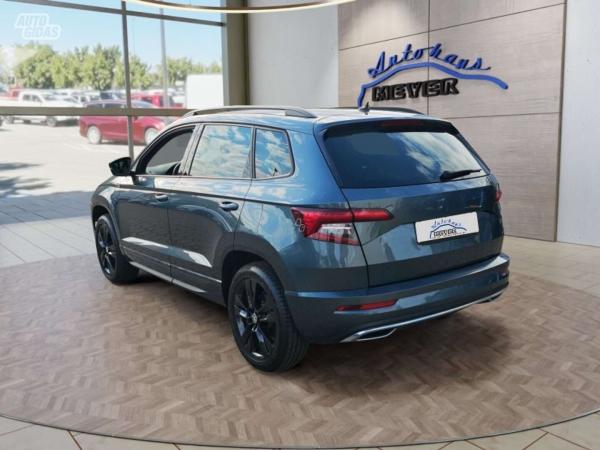 Grey Skoda Karoq 2019 in Kaunas, with an engine capacity of 2.00 L and mileage of 70 thousand km for 27962 €, photo 3 on AUTOMOTO.COM.LV