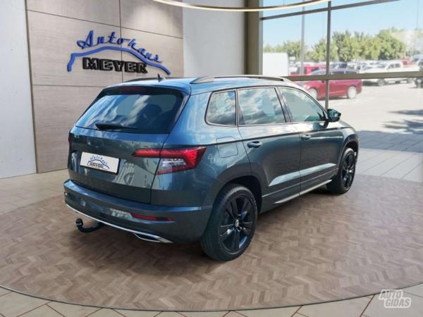 Grey Skoda Karoq 2019 in Kaunas, with an engine capacity of 2.00 L and mileage of 70 thousand km for 27962 €, photo 5 on AUTOMOTO.COM.LV