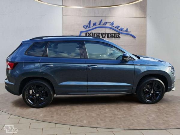 Grey Skoda Karoq 2019 in Kaunas, with an engine capacity of 2.00 L and mileage of 70 thousand km for 27962 €, photo 6 on AUTOMOTO.COM.LV