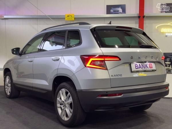 Grey Skoda Karoq 2020 in Kaunas, with an engine capacity of 1.50 L and mileage of 87 thousand km for 24715 €, photo 4 on AUTOMOTO.COM.LV