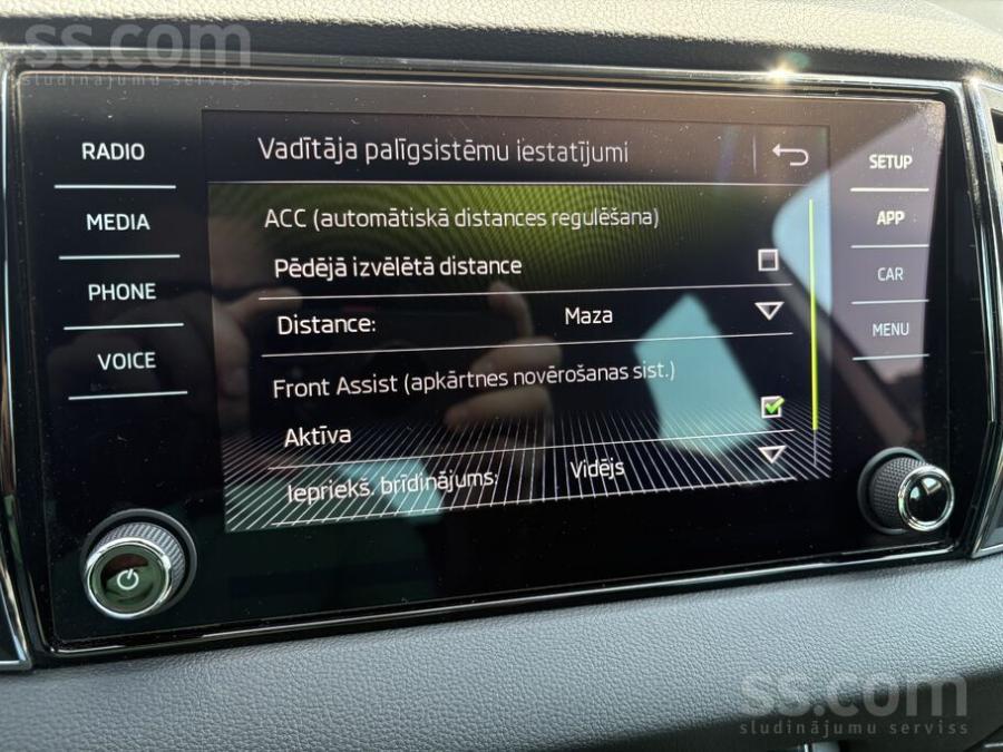Grey Skoda Karoq 2020 in Riga, with an engine capacity of 2.00 L and mileage of 133 thousand km for 21500 €, photo 32 on AUTOMOTO.COM.LV