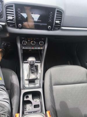 Grey Skoda Karoq 2020 in Panevezys, with an engine capacity of 1.97 L and mileage of 248 thousand km for 14500 €, photo 14 on AUTOMOTO.COM.LV