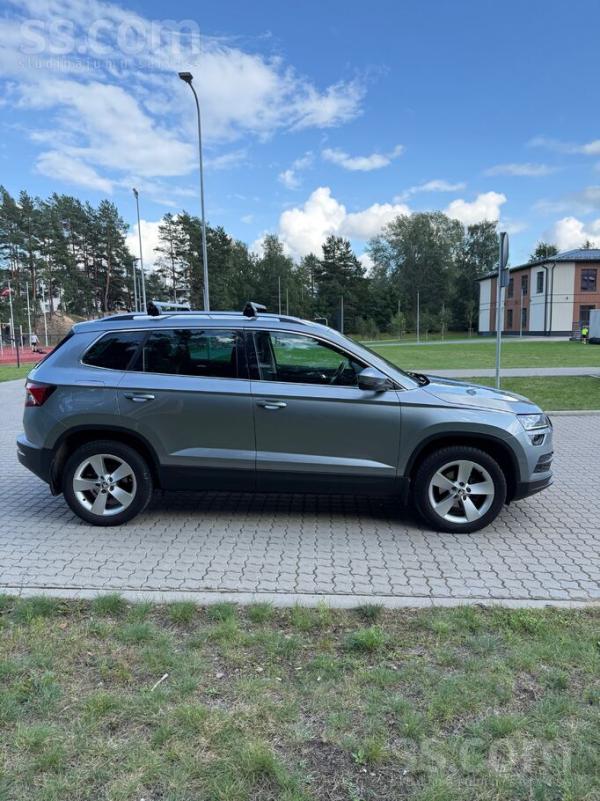 Grey Skoda Karoq 2021 in Riga, with an engine capacity of 1.50 L and mileage of 86 thousand km for 22000 €, photo 3 on AUTOMOTO.COM.LV