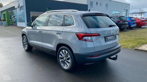 Grey Skoda Karoq 2021 in Kaunas, with an engine capacity of 2.00 L and mileage of 99 thousand km for 25353 €, photo 3 on AUTOMOTO.COM.LV