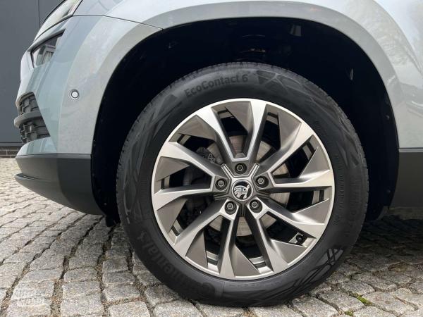 Grey Skoda Karoq 2021 in Kaunas, with an engine capacity of 2.00 L and mileage of 55 thousand km for 25995 €, photo 5 on AUTOMOTO.COM.LV