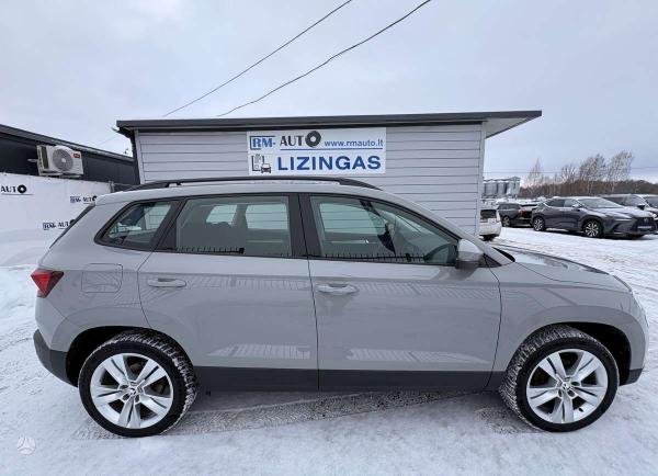 Grey Skoda Karoq 2021 in Panevezys, with an engine capacity of 1.97 L and mileage of 200 thousand km for 15300 €, photo 4 on AUTOMOTO.COM.LV