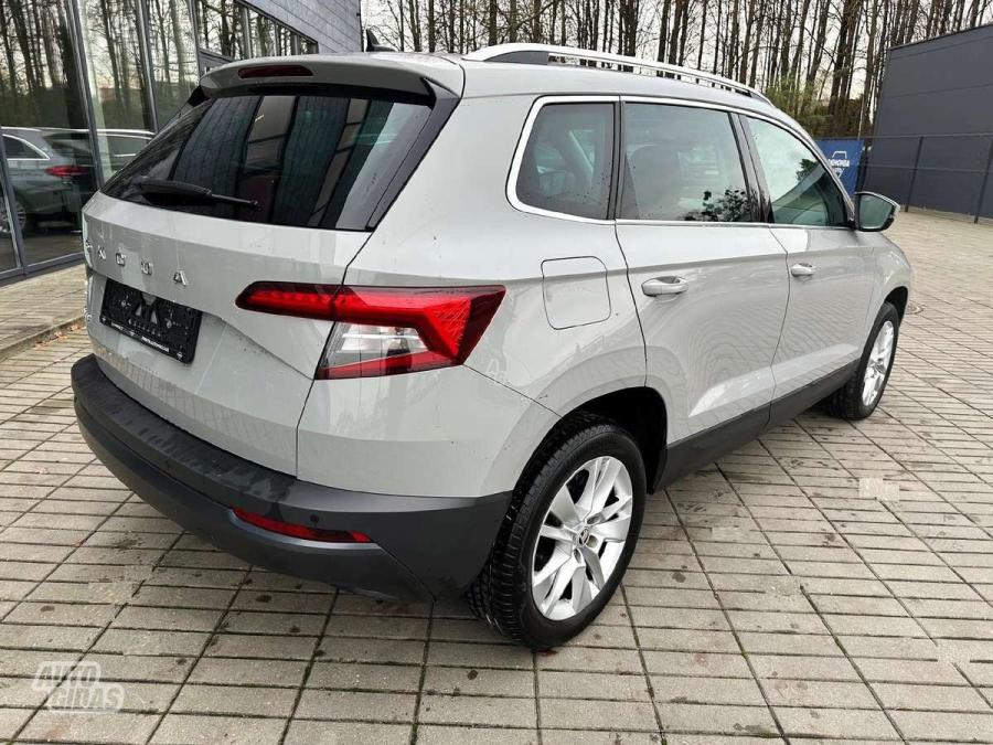 Grey Skoda Karoq 2021 in Kaunas, with an engine capacity of 1.00 L and mileage of 200 thousand km for 13500 €, photo 4 on AUTOMOTO.COM.LV