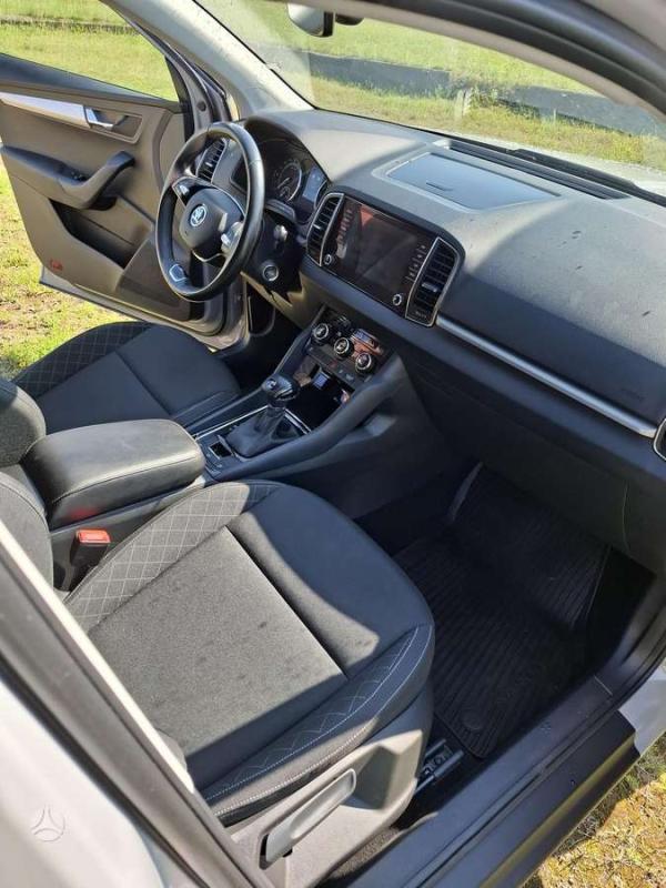 Grey Skoda Karoq 2021 in Kelme, with an engine capacity of 1.97 L and mileage of 88 thousand km for 18000 €, photo 6 on AUTOMOTO.COM.LV