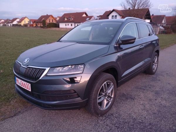 Grey Skoda Karoq 2022 in Kaunas, with an engine capacity of 1.50 L and mileage of 54 thousand km for 25954 €, photo 2 on AUTOMOTO.COM.LV