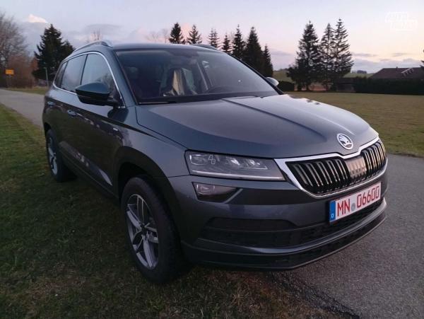 Grey Skoda Karoq 2022 in Kaunas, with an engine capacity of 1.50 L and mileage of 54 thousand km for 25954 €, photo 4 on AUTOMOTO.COM.LV