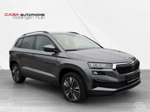 Grey Skoda Karoq 2022 in Kaunas, with an engine capacity of 1.50 L and mileage of 31 thousand km for 29543 €, photo 3 on AUTOMOTO.COM.LV