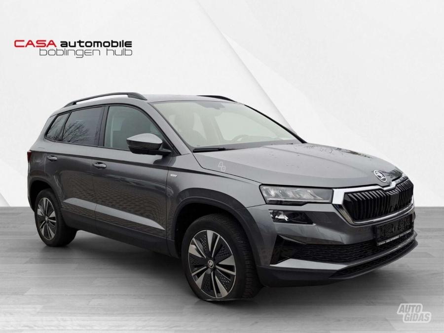 Grey Skoda Karoq 2022 in Kaunas, with an engine capacity of 1.50 L and mileage of 31 thousand km for 29543 €, photo 3 on AUTOMOTO.COM.LV