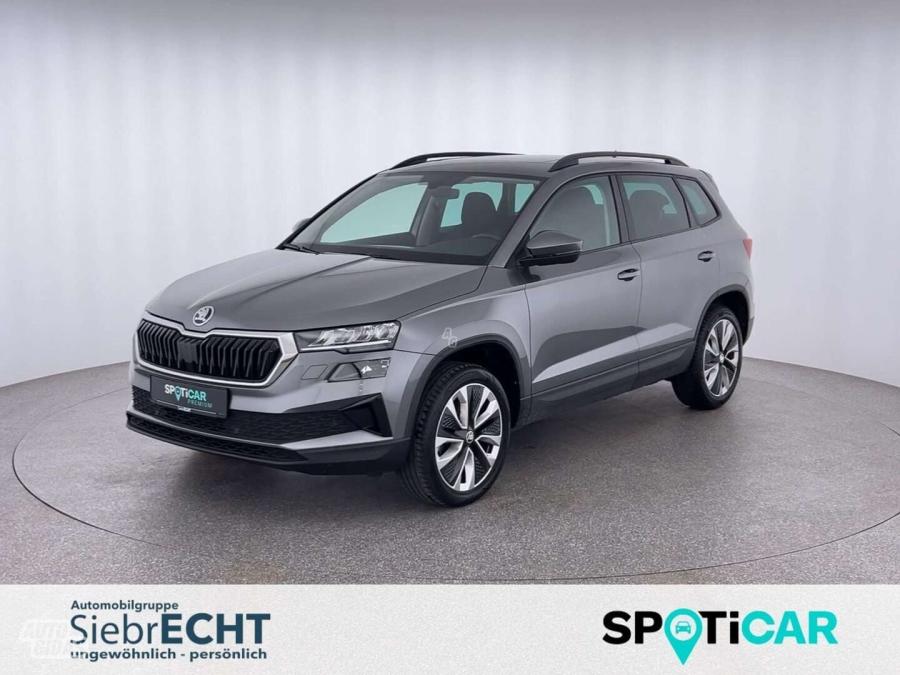 Grey Skoda Karoq 2022 in Kaunas, with an engine capacity of 2.00 L and mileage of 50 thousand km for 28549 €, photo 1 on AUTOMOTO.COM.LV