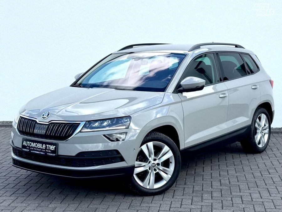 Grey Skoda Karoq 2022 in Kaunas, with an engine capacity of 2.00 L and mileage of 95 thousand km for 29019 €, photo 1 on AUTOMOTO.COM.LV