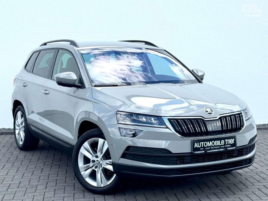 Grey Skoda Karoq 2022 in Kaunas, with an engine capacity of 2.00 L and mileage of 95 thousand km for 29019 €, photo 3 on AUTOMOTO.COM.LV
