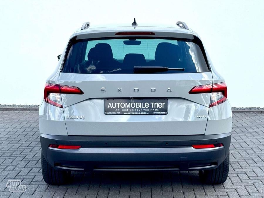 Grey Skoda Karoq 2022 in Kaunas, with an engine capacity of 2.00 L and mileage of 95 thousand km for 29019 €, photo 6 on AUTOMOTO.COM.LV