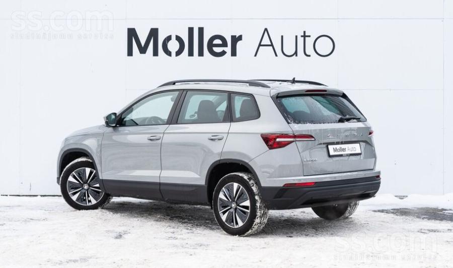 Grey Skoda Karoq 2022 in Riga, with an engine capacity of 2.00 L and mileage of 84 thousand km for 23250 €, photo 3 on AUTOMOTO.COM.LV