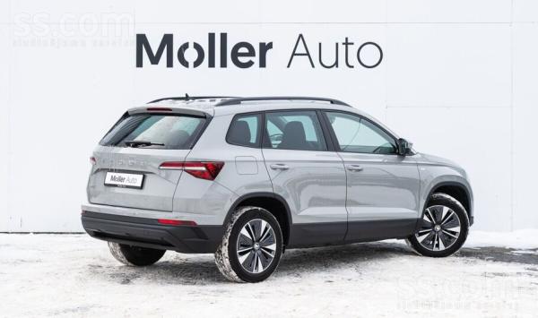 Grey Skoda Karoq 2022 in Riga, with an engine capacity of 2.00 L and mileage of 84 thousand km for 23250 €, photo 4 on AUTOMOTO.COM.LV