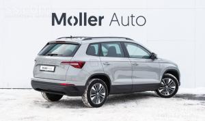 Grey Skoda Karoq 2022 in Riga, with an engine capacity of 2.00 L and mileage of 84 thousand km for 23250 €, photo 4 on AUTOMOTO.COM.LV