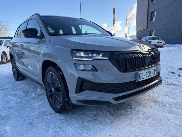 Grey Skoda Karoq 2022 in Kaunas, with an engine capacity of 1.97 L and mileage of 183 thousand km for 21500 €, photo 1 on AUTOMOTO.COM.LV