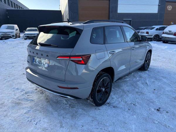 Grey Skoda Karoq 2022 in Kaunas, with an engine capacity of 1.97 L and mileage of 183 thousand km for 21500 €, photo 4 on AUTOMOTO.COM.LV