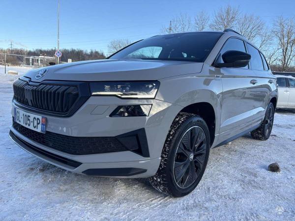 Grey Skoda Karoq 2022 in Kaunas, with an engine capacity of 1.97 L and mileage of 183 thousand km for 21500 €, photo 7 on AUTOMOTO.COM.LV