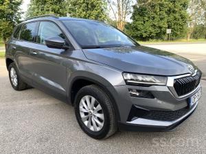 Grey Skoda Karoq 2022 in Ogre, with an engine capacity of 2.00 L and mileage of 142 thousand km for 18350 €, photo  on AUTOMOTO.COM.LV