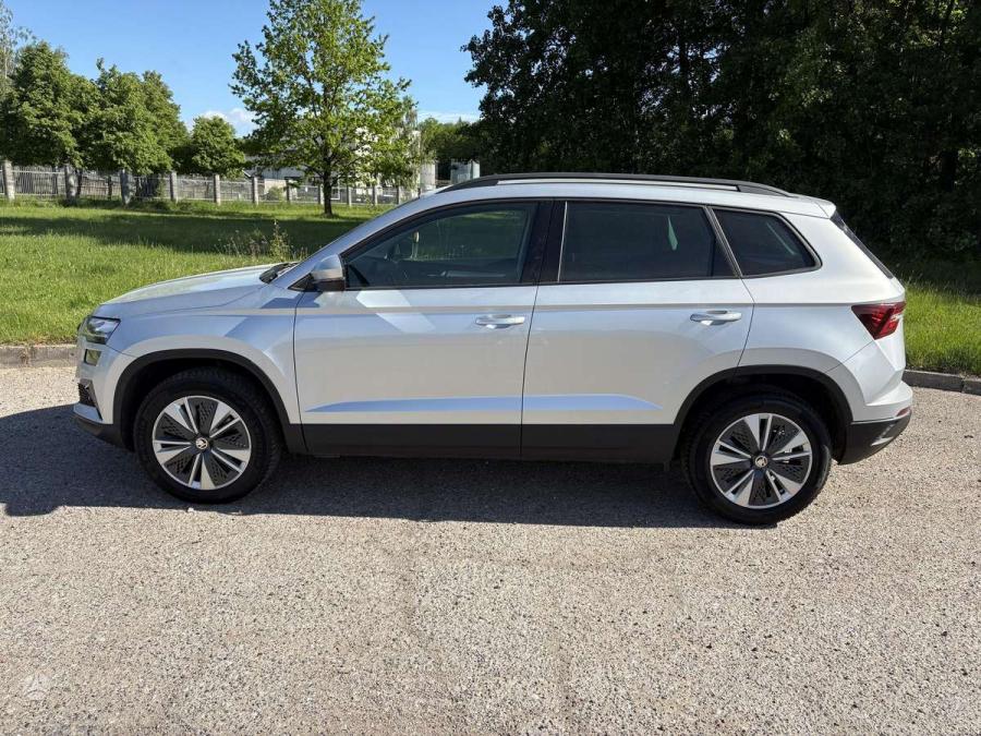 Grey Skoda Karoq 2022 in Kaunas, with an engine capacity of 1.97 L and mileage of 190 thousand km for 16300 €, photo 4 on AUTOMOTO.COM.LV