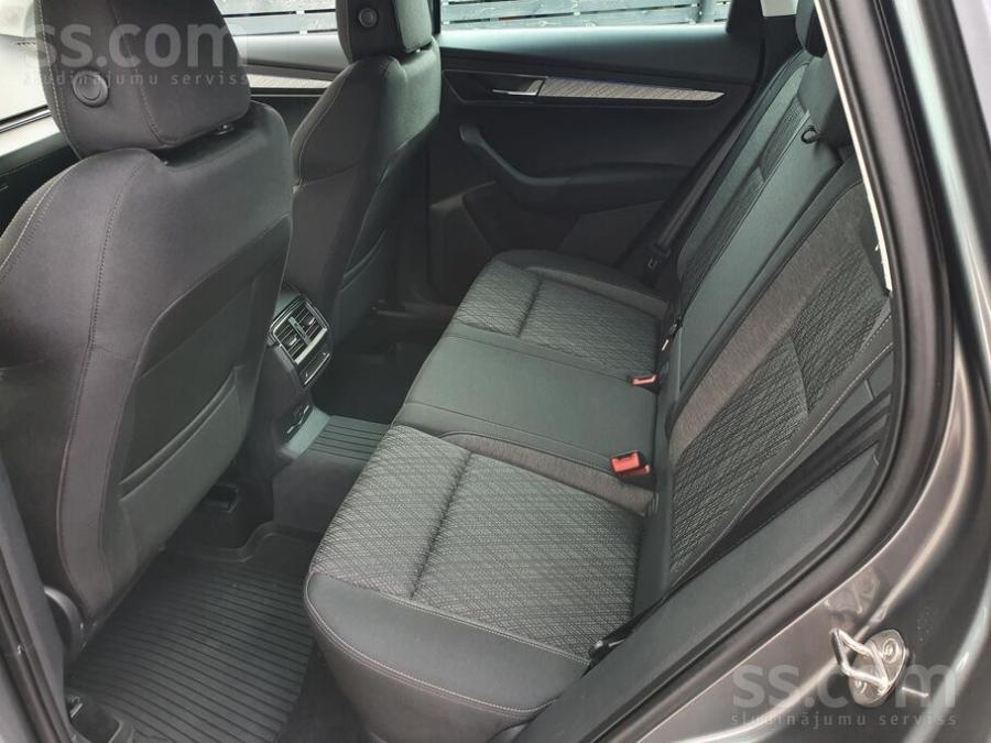 Grey Skoda Karoq 2023 in Riga, with an engine capacity of 1.50 L and mileage of 31 thousand km for 28900 €, photo 10 on AUTOMOTO.COM.LV