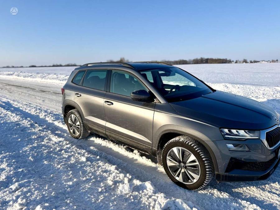 Grey Skoda Karoq 2023 in Kaunas, with an engine capacity of 1.97 L and mileage of 128 thousand km for 23200 €, photo 1 on AUTOMOTO.COM.LV