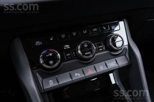 Grey Skoda Karoq 2023 in Riga, with an engine capacity of 1.50 L and mileage of 143 thousand km for 21950 €, photo 14 on AUTOMOTO.COM.LV